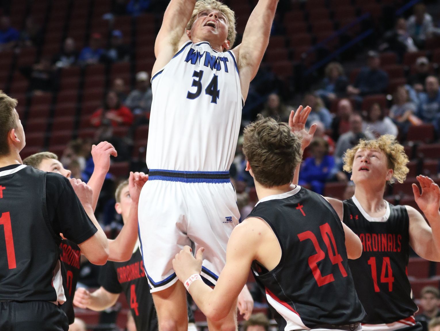 Wynot falls in triple overtime game